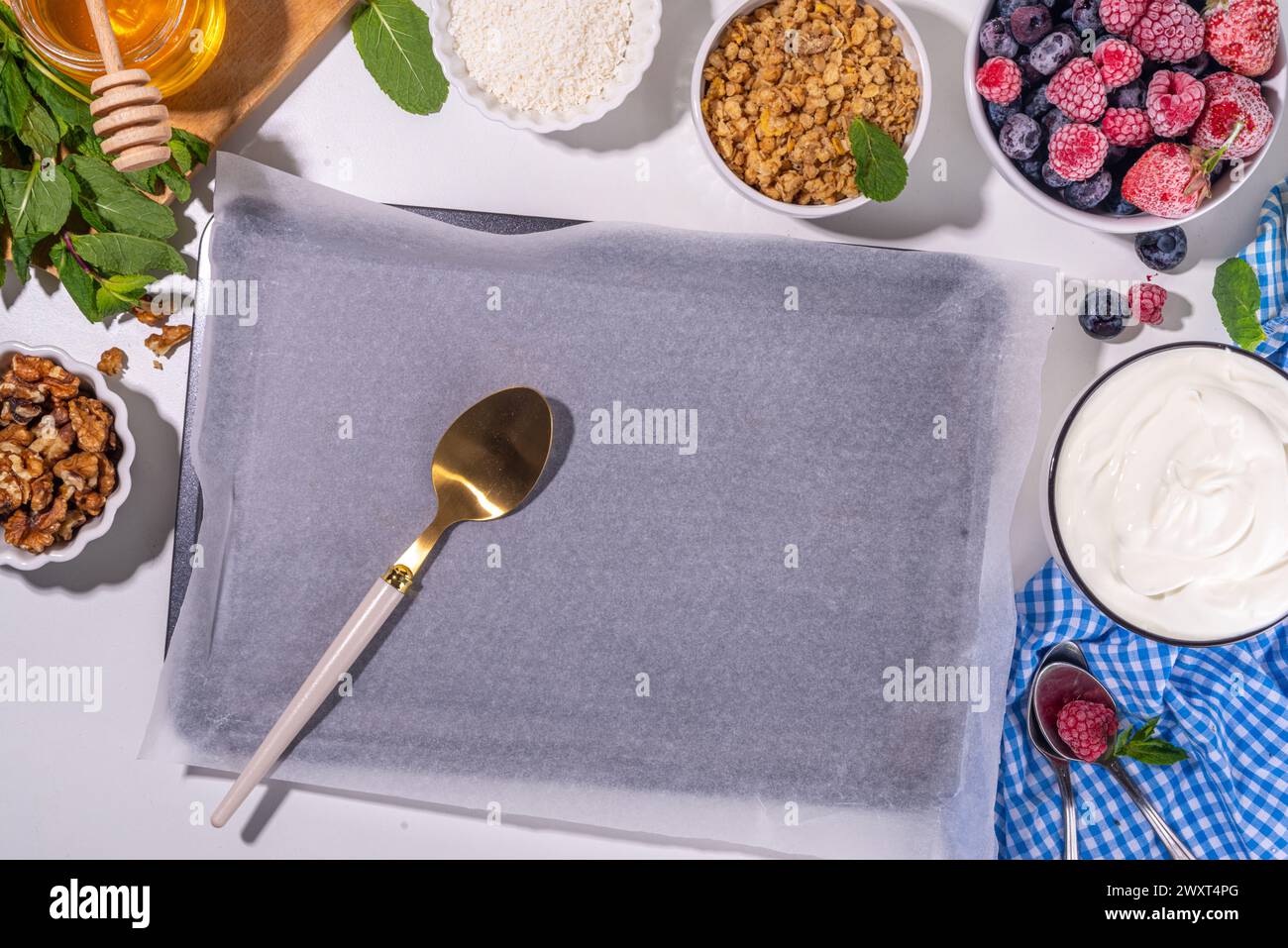 Cooking making Frozen Yogurt Bark background with greek yogurt, fresh ...