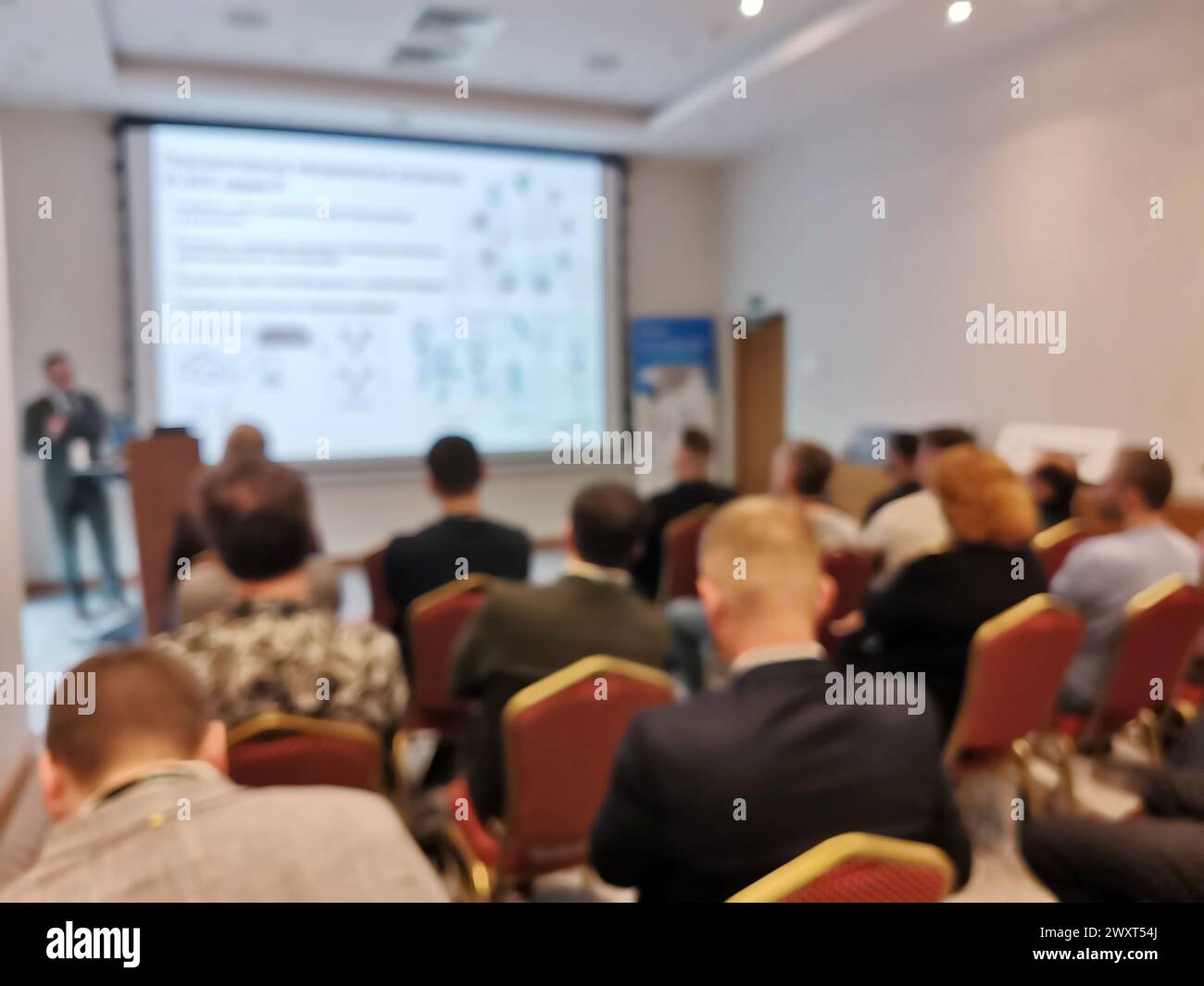 Audience listens lecturer conference hall hi-res stock photography and ...