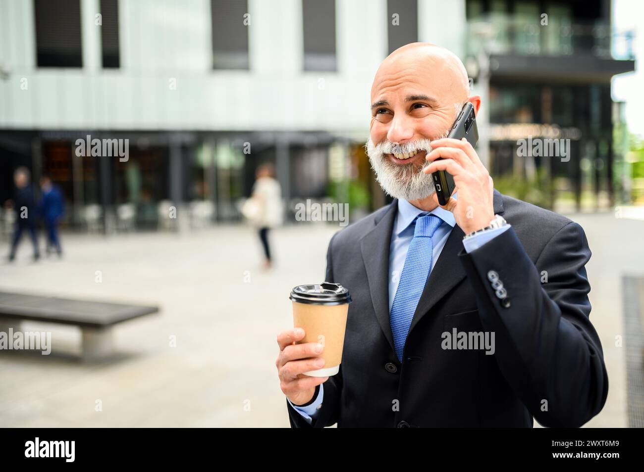 Happy mature bald businessman looking hi-res stock photography and ...
