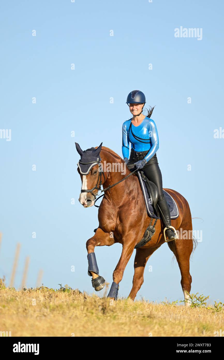 Horseback rider wearing a shiny leotard and faux leather riding ...