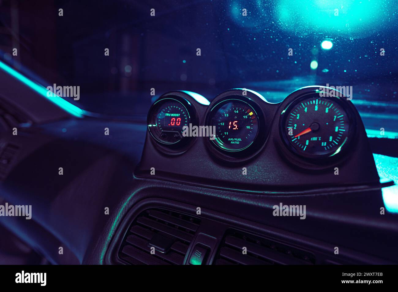 Car Dashboard With Three Gauges and Speedometer Stock Photo - Alamy