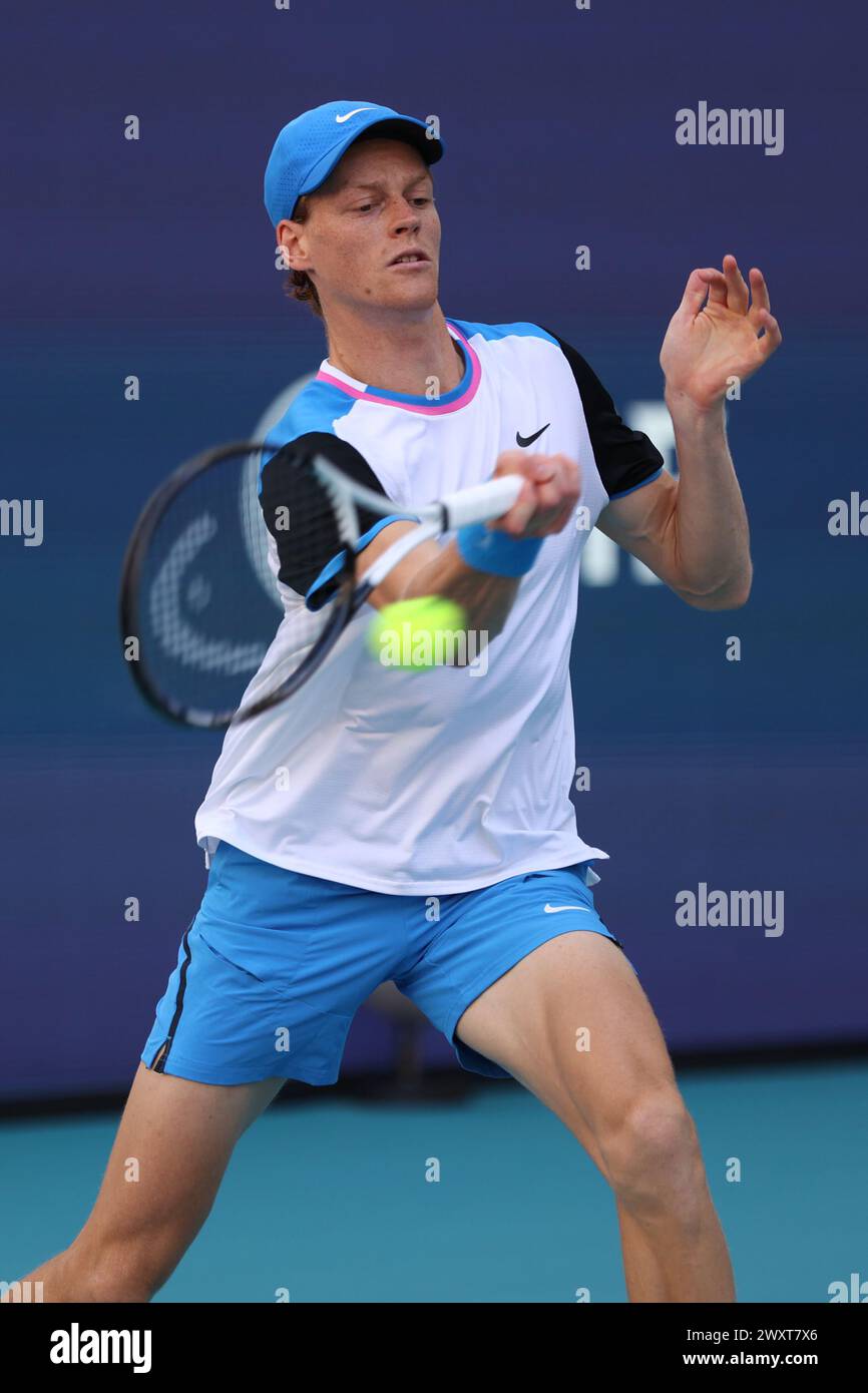 Jannik Sinner hits a forehand at the Miami Open on March 31, 2024 in ...