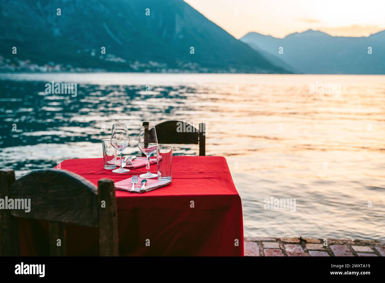 Served table in restaurant on sea background. Travel food relax concept ...