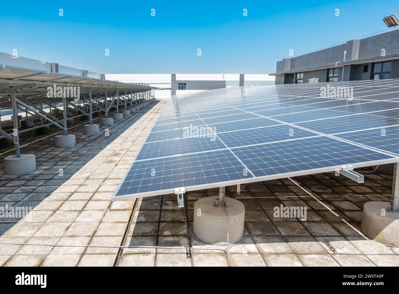 solar panels on the top floor of a building Stock Photo - Alamy