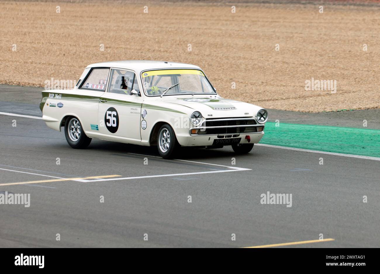 Adam Cunnington driving his White and Green, 1965, Ford Lotus Cortina ...