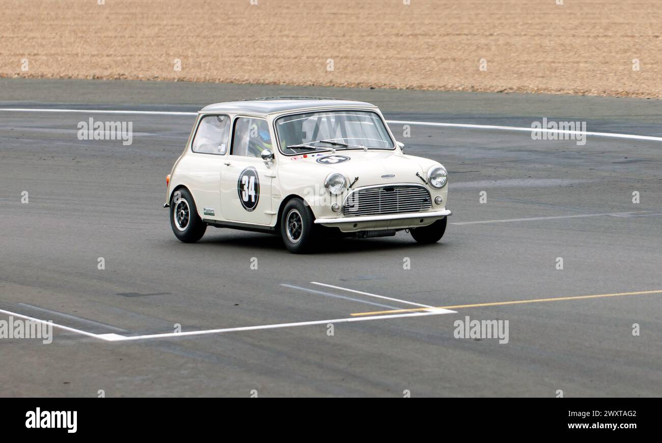 Tom Bell and Joe Ferguson's White, 1965, Austin Mini Cooper S, during ...