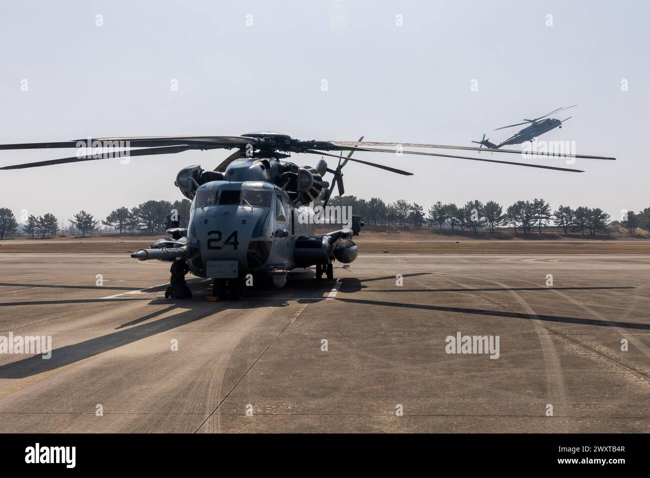 A U.S. Marine Corps CH-53E Super Stallion helicopter with Marine Heavy ...