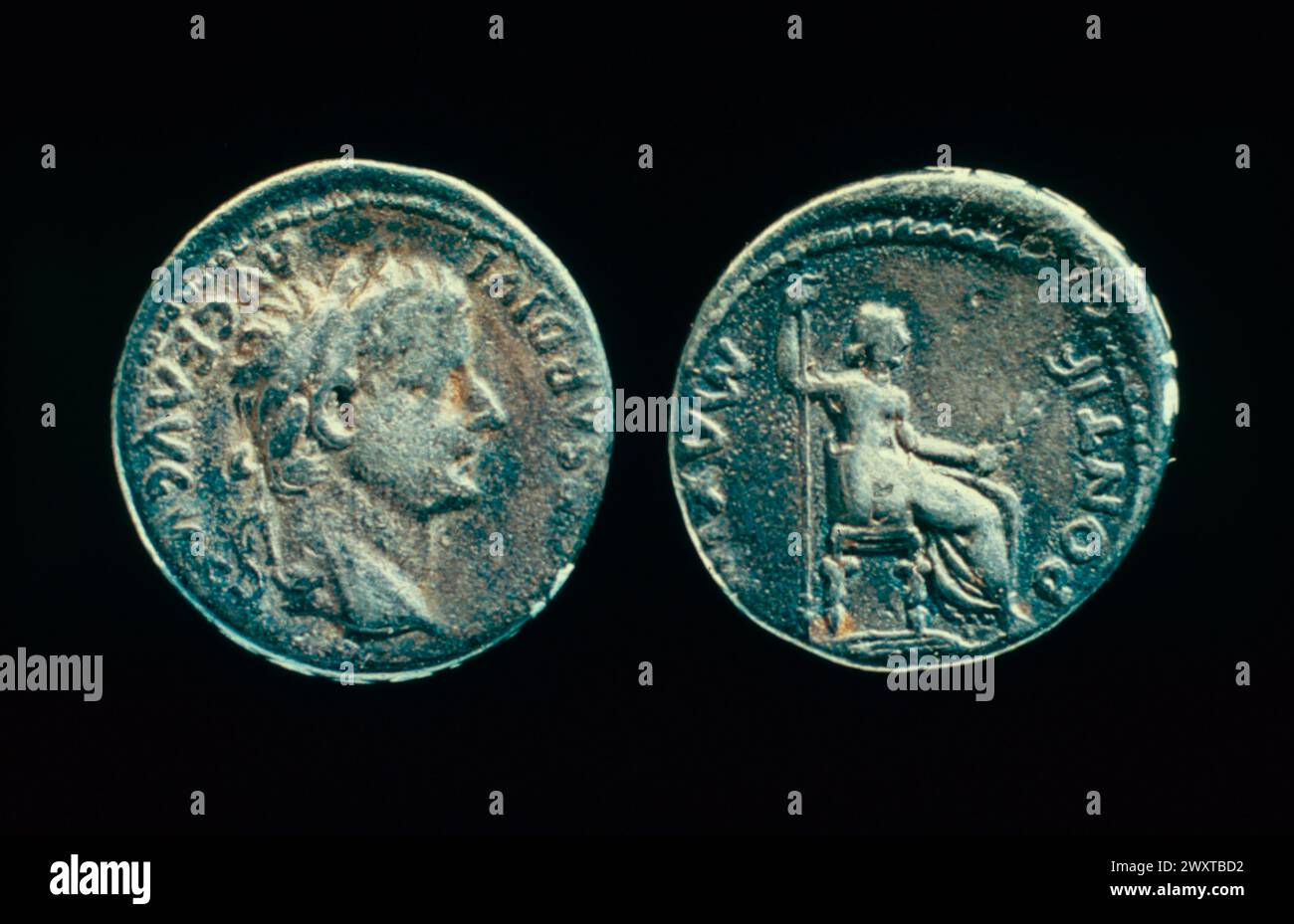 Ancient silver coin with the head of Roman emperor Tiberius Caesar, 30 ...