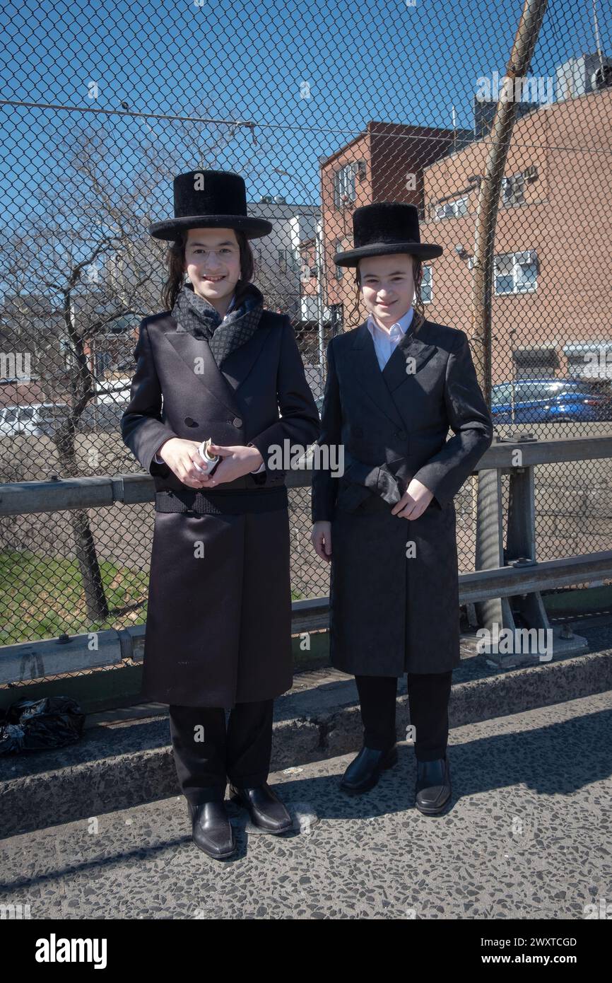 Portrait of 2 Hasidic teens who spent the Purim holiday collecting ...