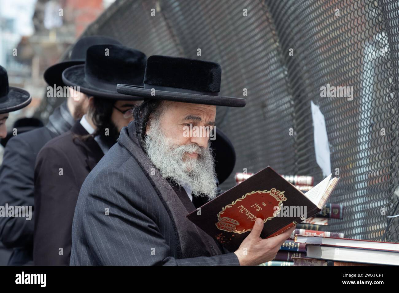 On a warm early spring day orthodox Jewish men shop at a pop up store ...