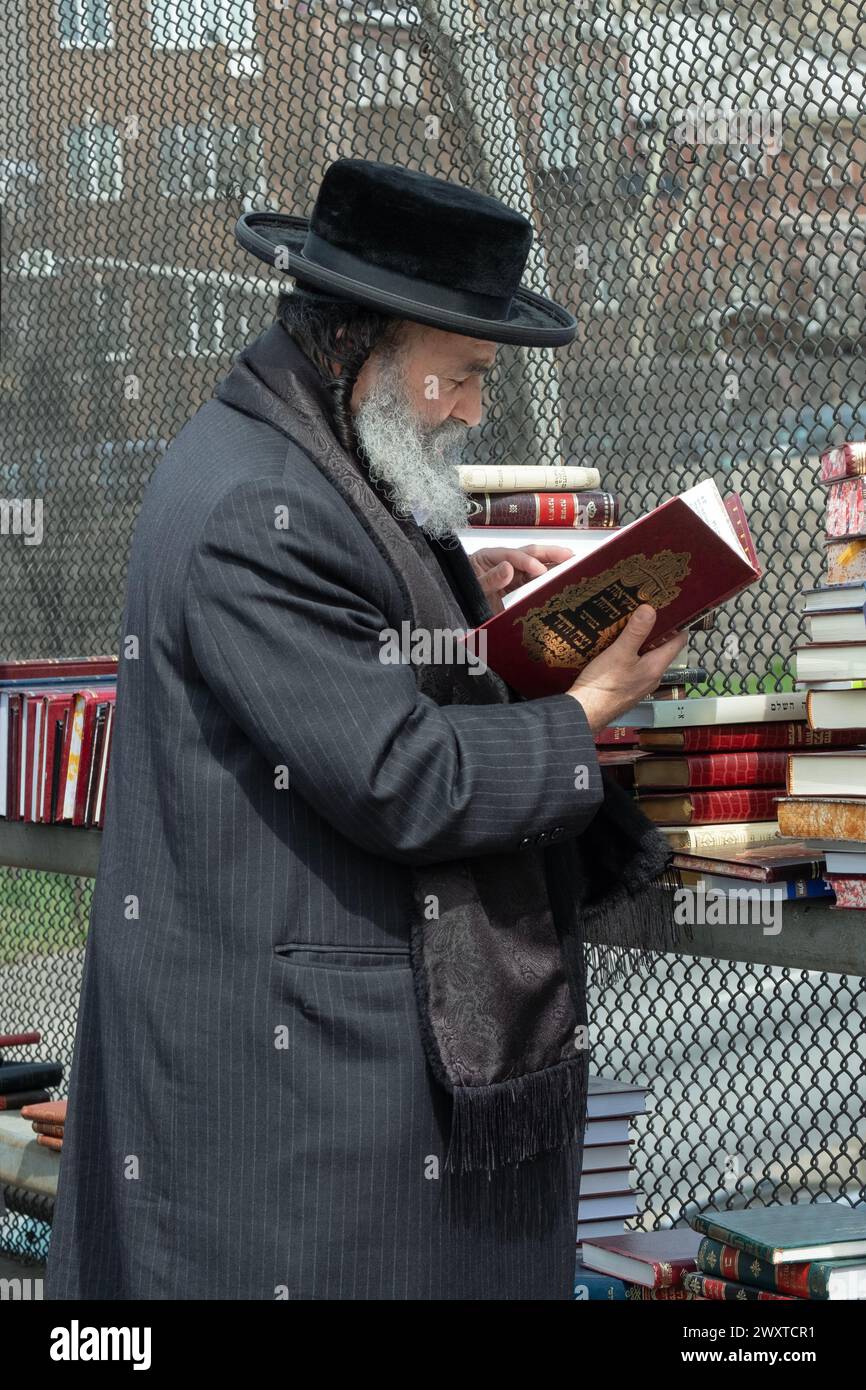 On a warm early spring day orthodox Jewish men shop at a pop up store ...