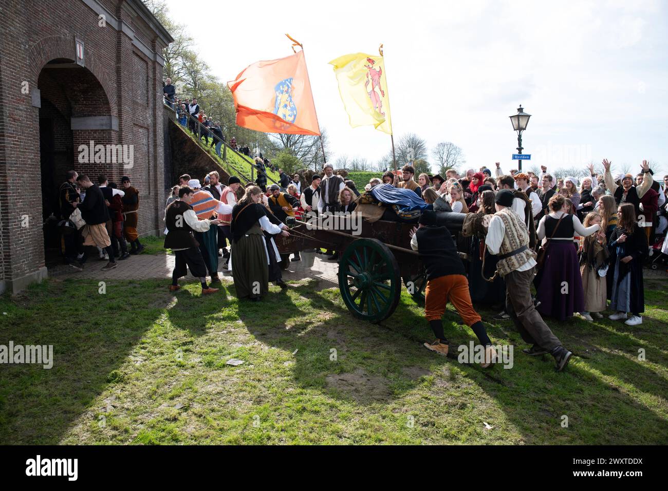 Brielle,Holland,1-04-2024:woman plays fallen woman and lies on the ...
