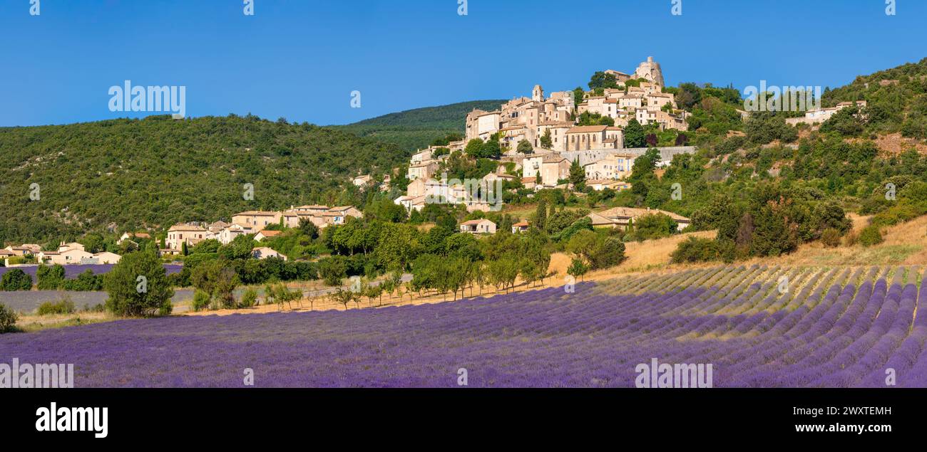 The Provence hilltop perched village of Simiane-la-Rotonde in summer ...