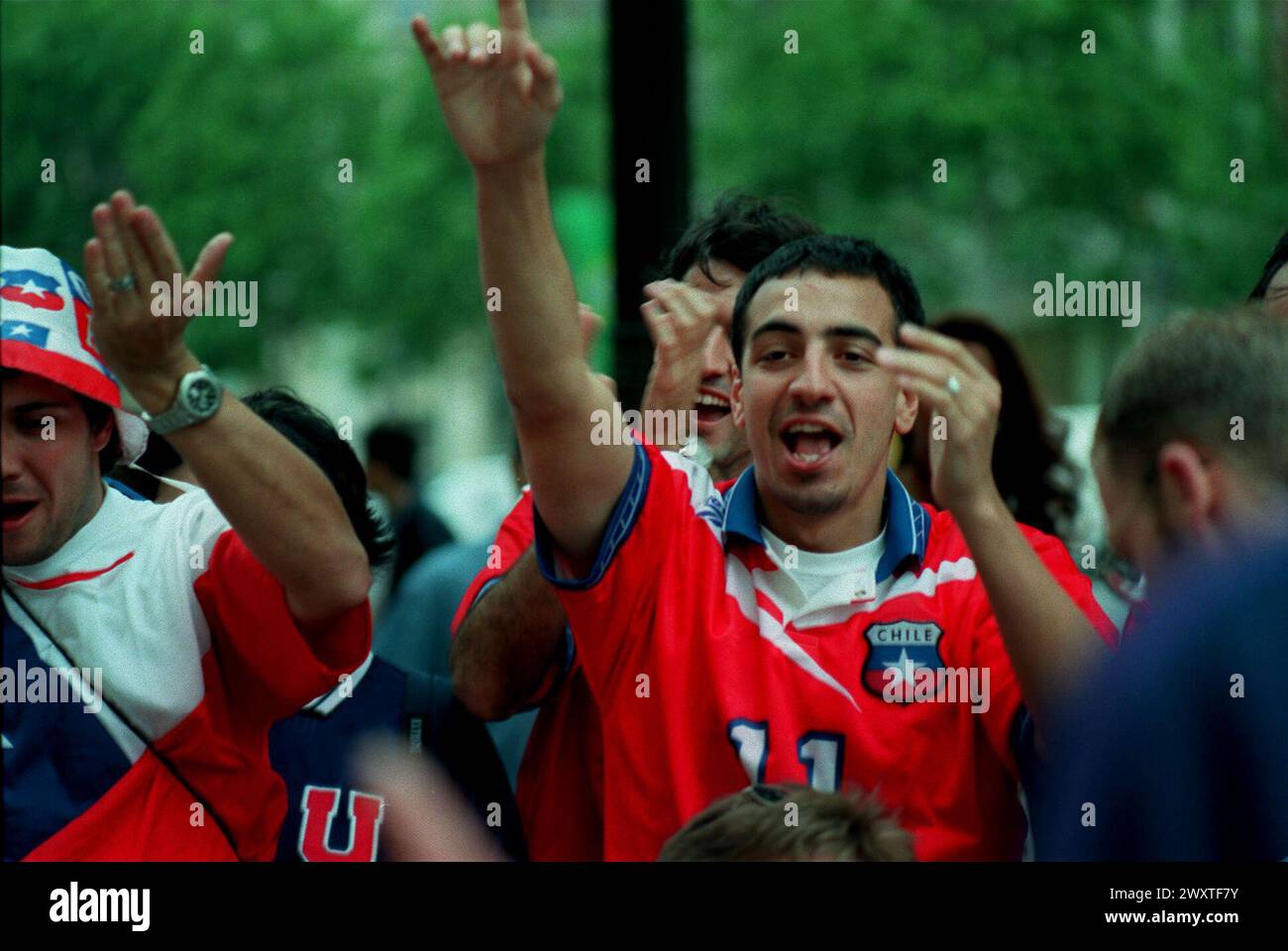 SUPPORTERS OF CHILIE TAUNT THE SCOTLAND FANS ON THE CHAMPES ELYSEES ...