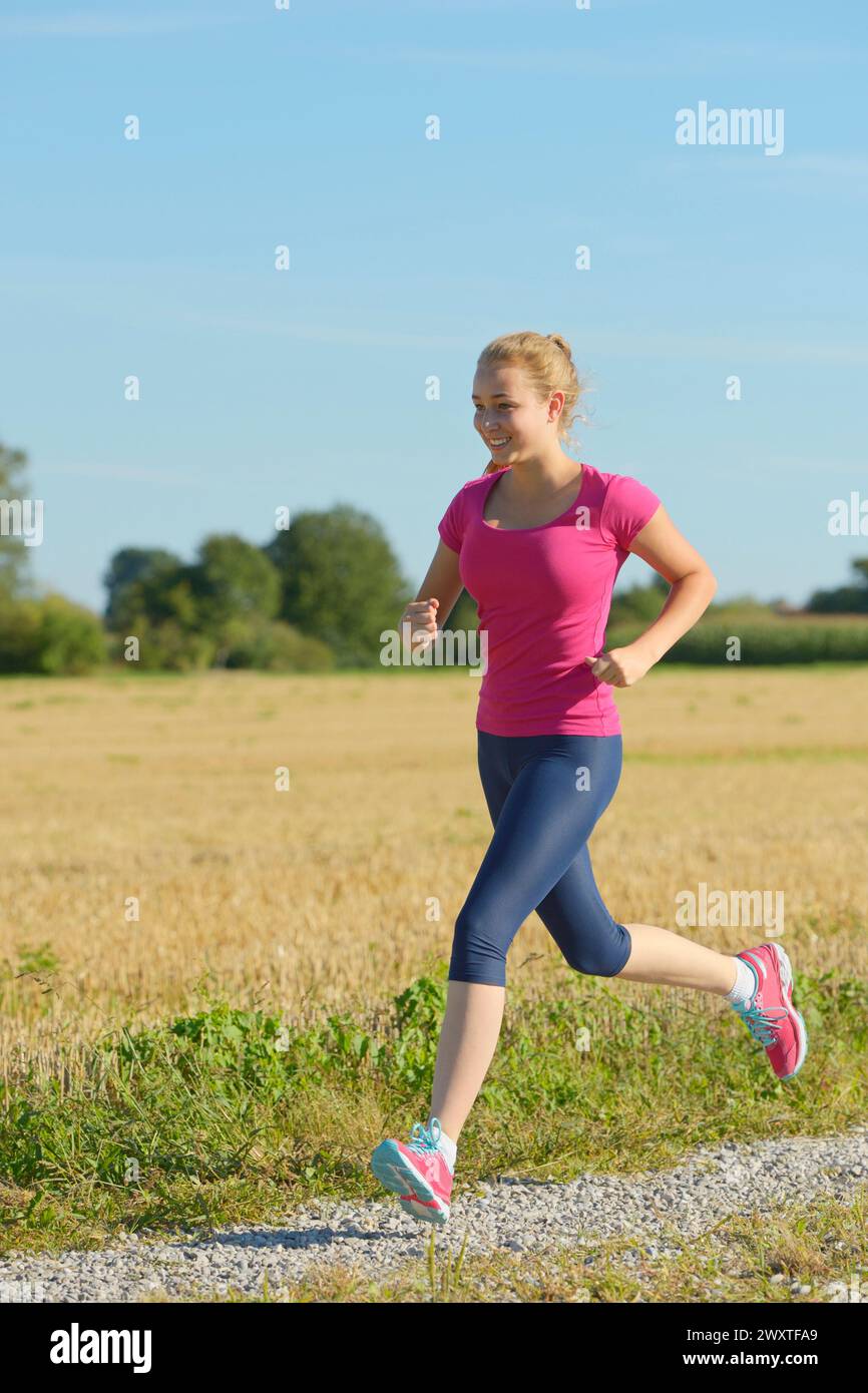 Teen running hi-res stock photography and images - Alamy