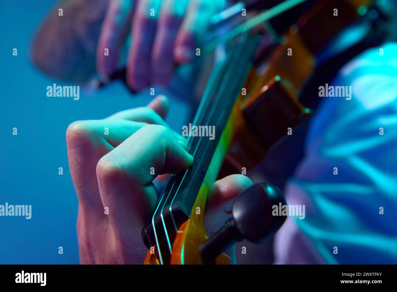 Cropped image of male hands plying violin. Man making performance ...