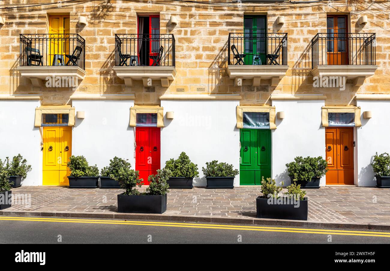 Marsaxlokk, Malta - Traditional maltese vintage house with orange, blue ...