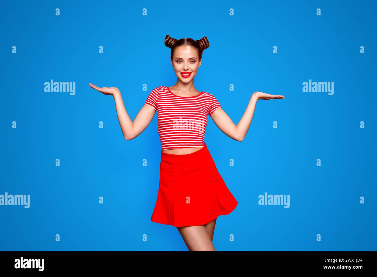 Make your choice Portrait of young brunettewoman holding and ...