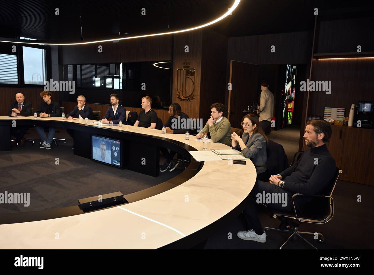 Genk's head coach Wouter Vrancken (C) and former Westerlo coach Rik De ...