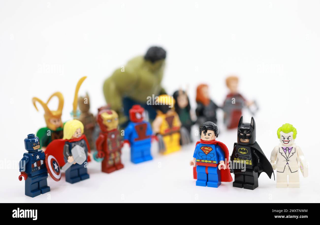 superman team stand against the avengers team Stock Photo - Alamy