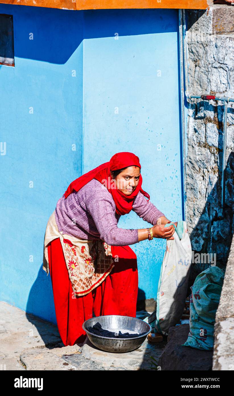 Indian woman washing clothes hi-res stock photography and images - Alamy