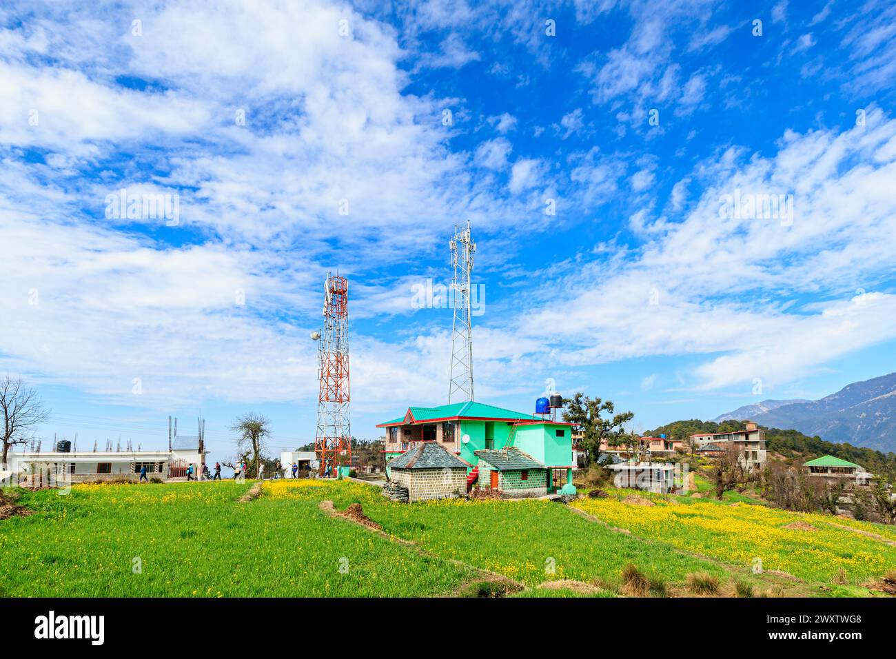 Buildings and lattice communications masts in the village at Naddi View ...