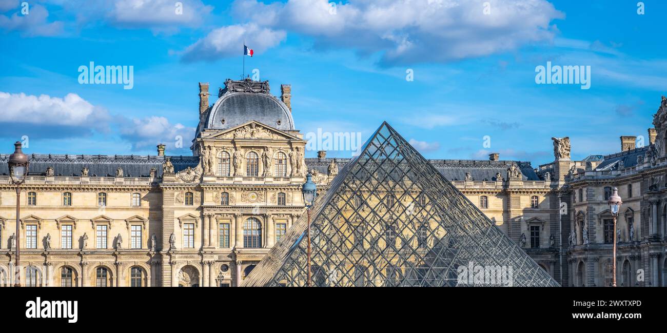 The Louvre Museums classical architecture contrasts with the modern ...