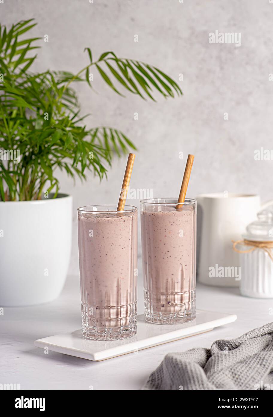 Food photography of protein milkshake; raspberry; strawberry; blueberry ...