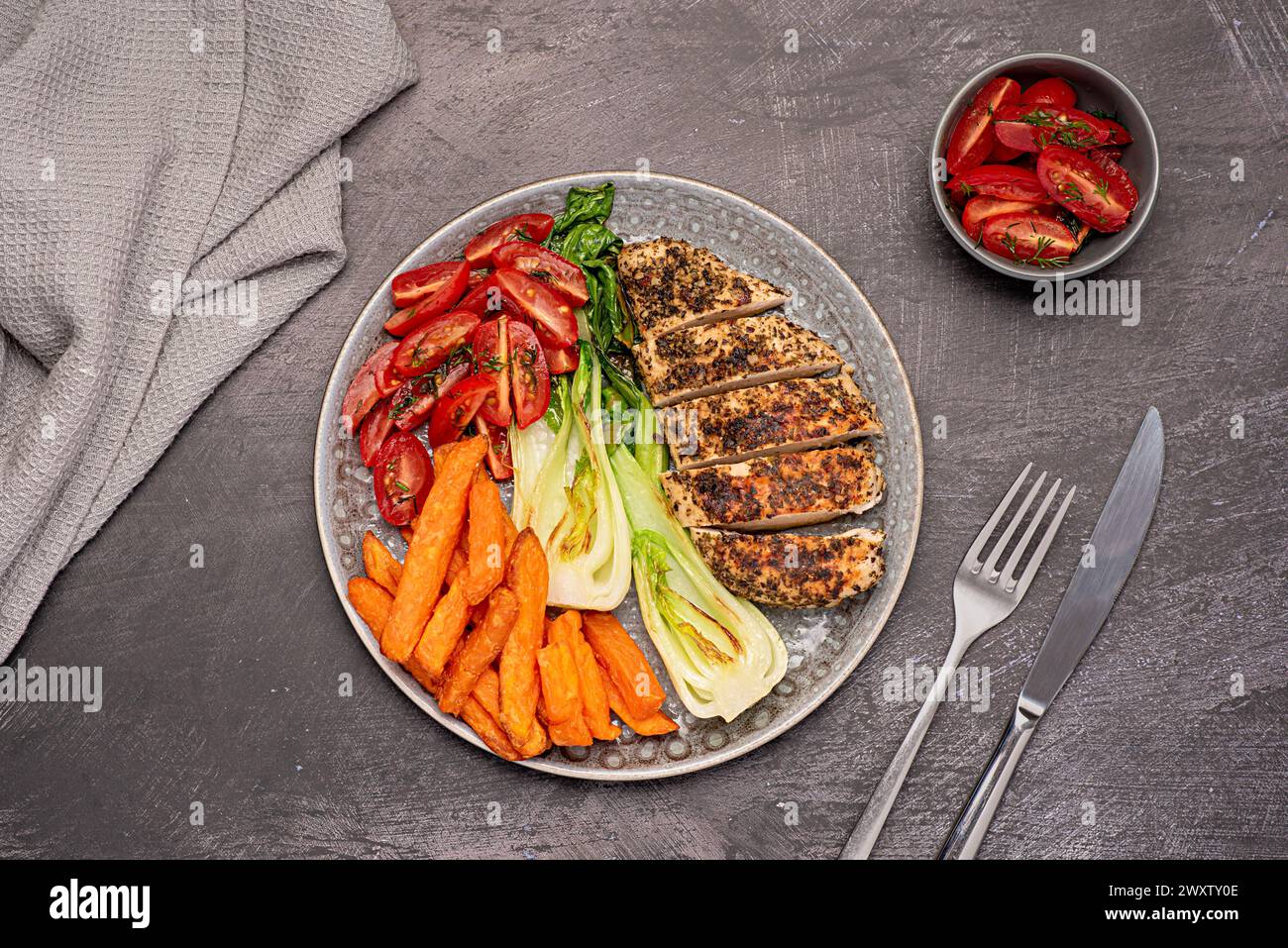 Food photography of roasted chicken, fillet, bok choy, tomato, fried ...