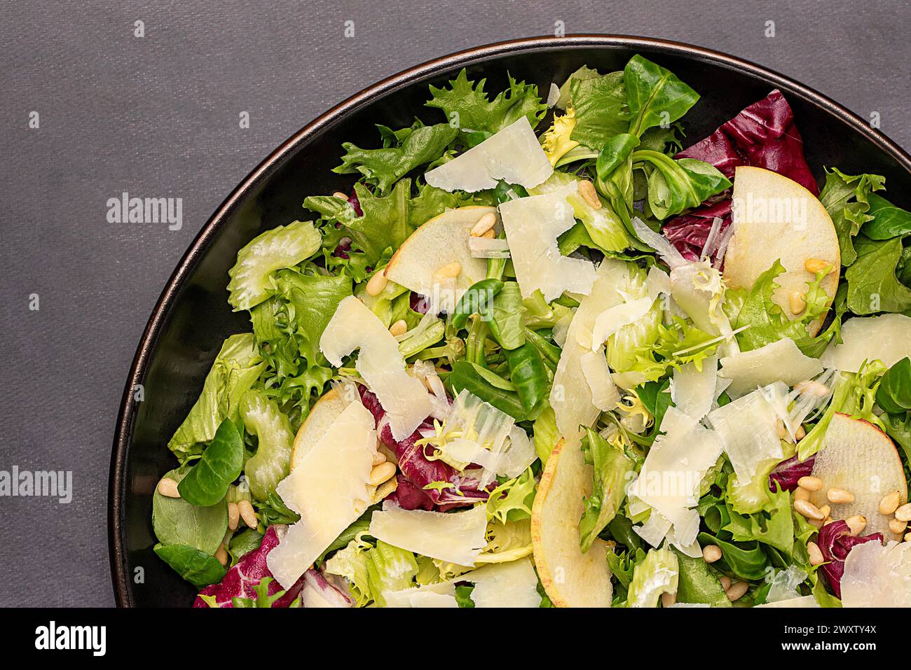 Macro food photography of salad; lettuce; apple, leaf; parmesan cheese ...