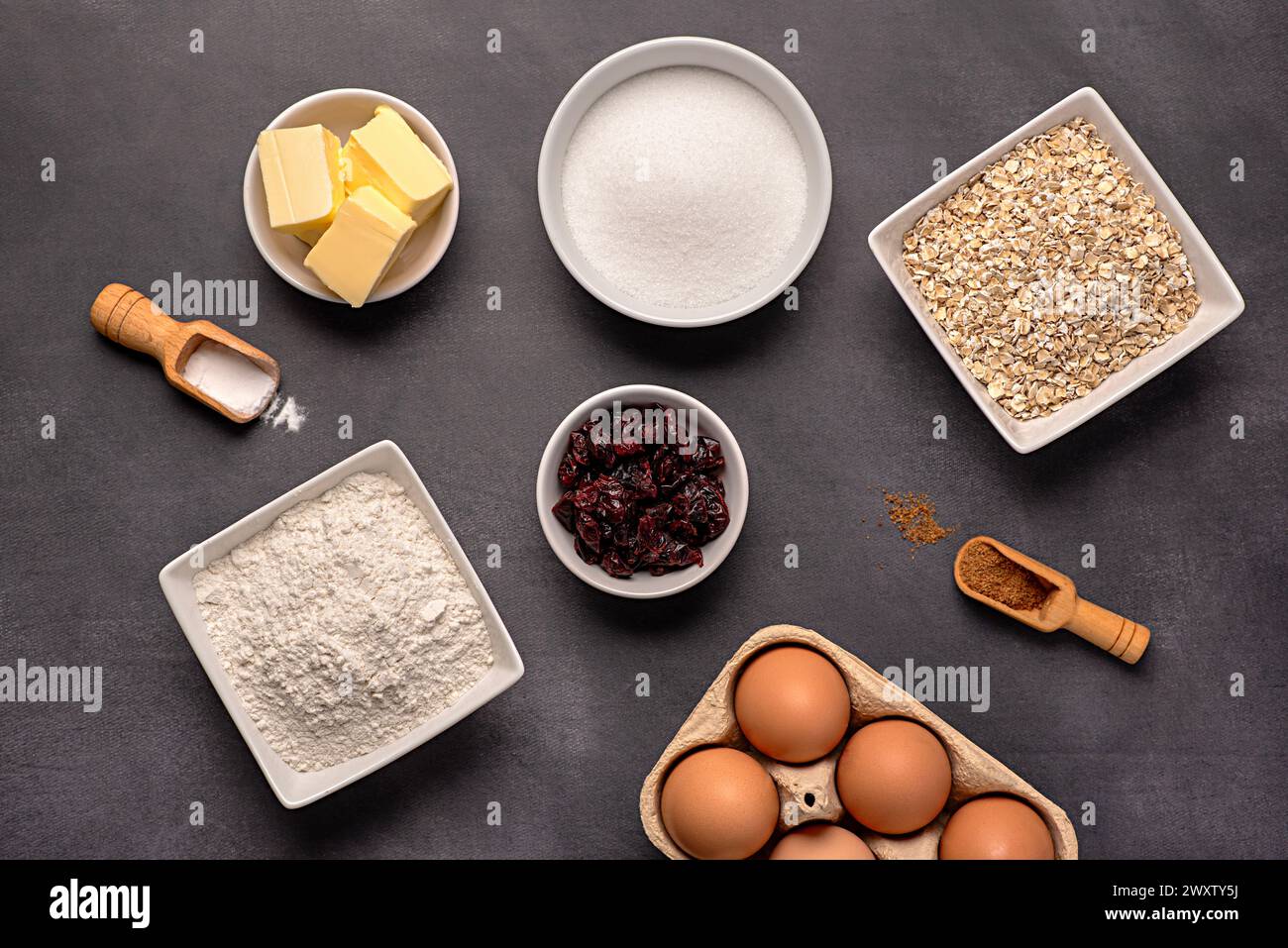 Food photography of raw ingredients of oat biscuits, cookie, dough, egg ...