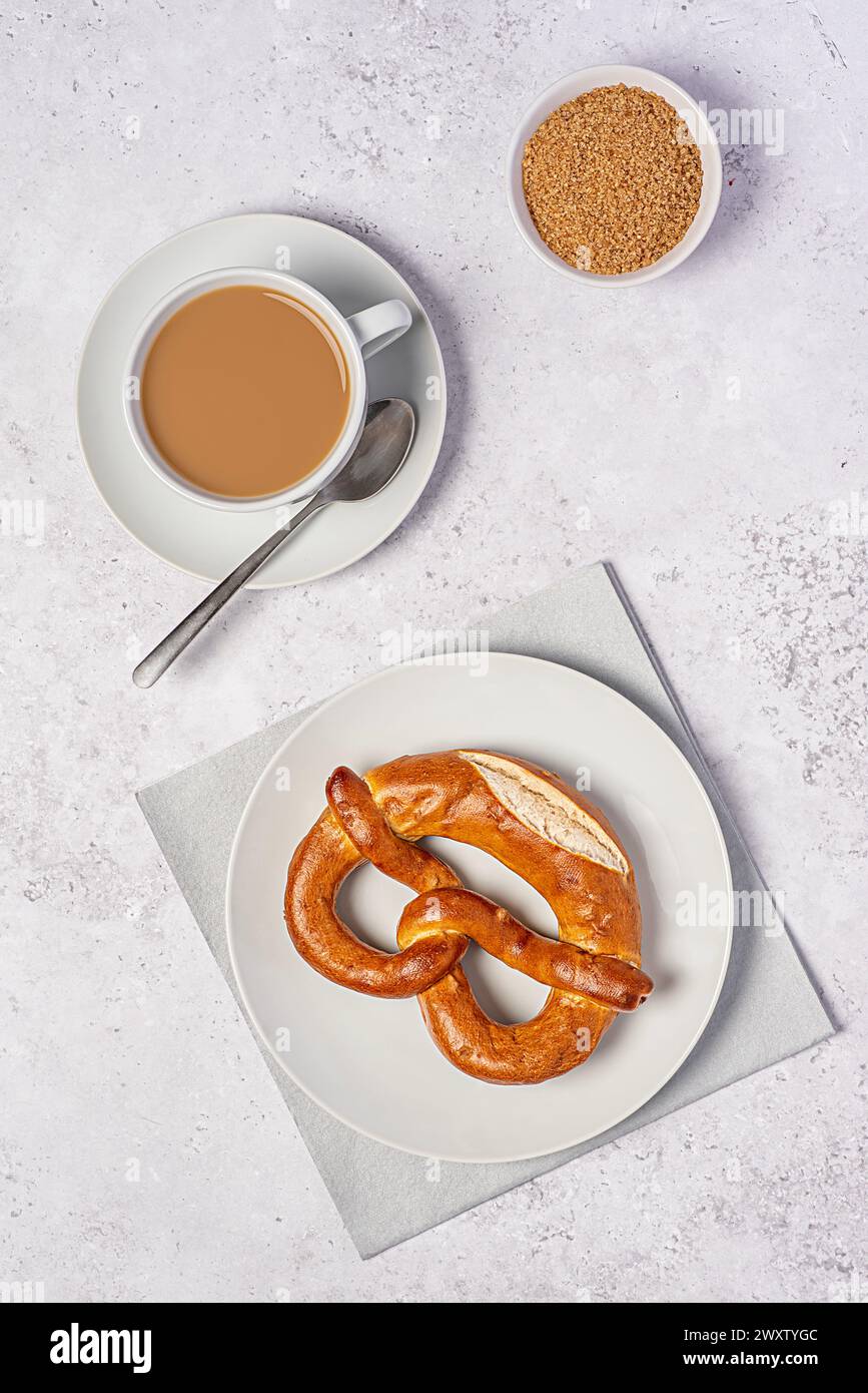 Food photography of coffee with milk, pretzel, cappuccino; bavarian ...