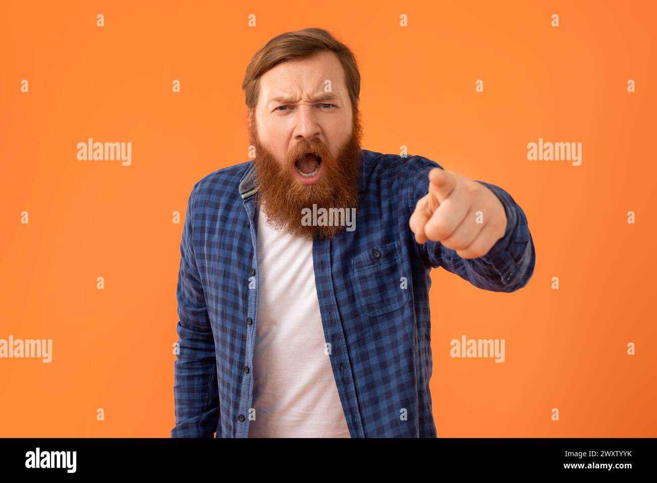 Aggressive Mad Redhaired Man Pointing Finger At Camera Shouting, Studio ...