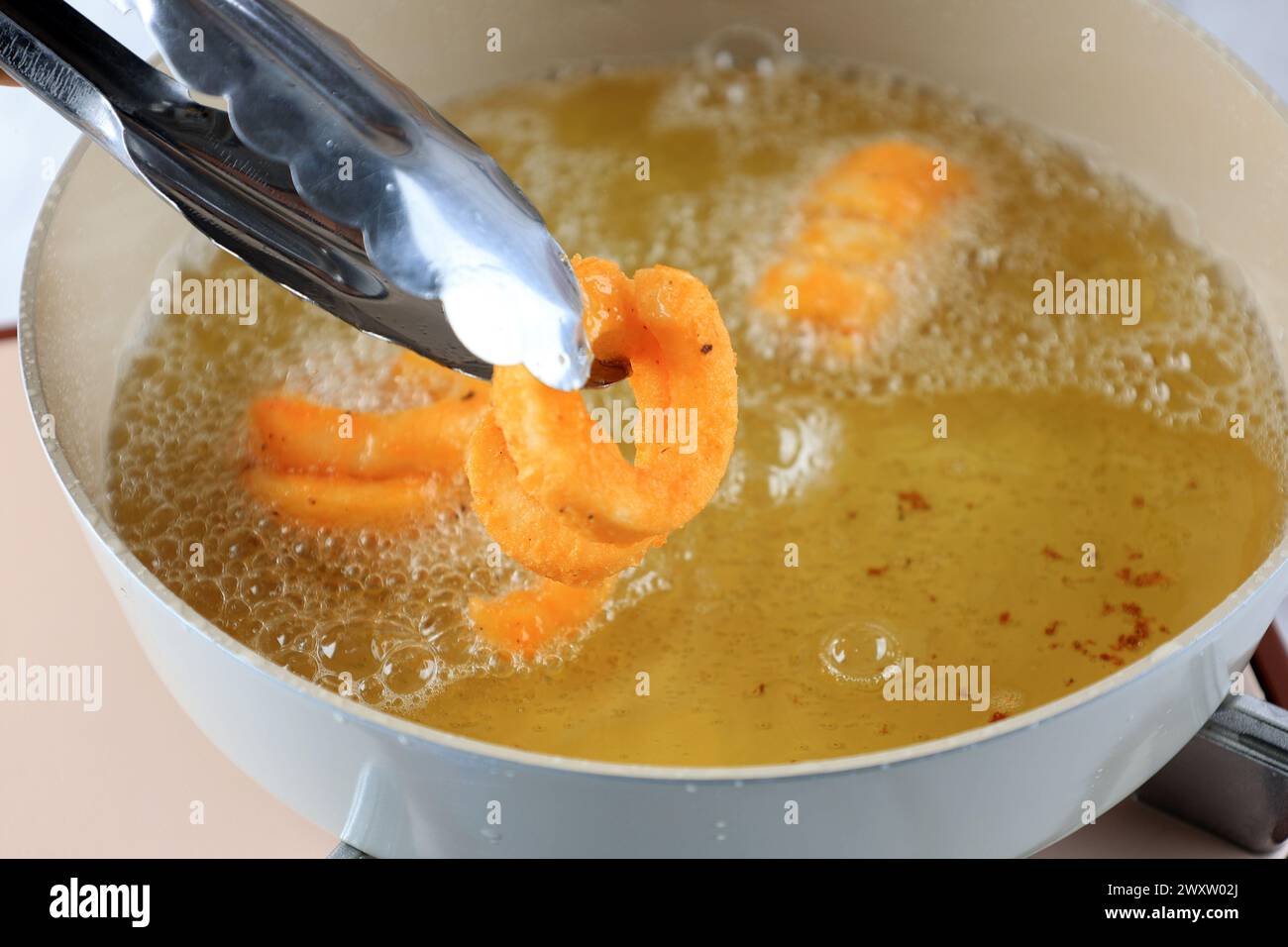 Close Up Frying Swirl Fried Potato French Fries, Step by Step in the ...