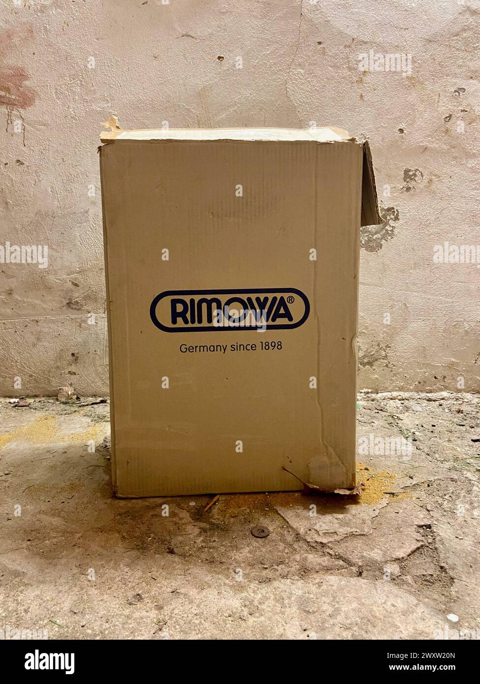 cardboard rimowa box with german language labels and distinctive design ...
