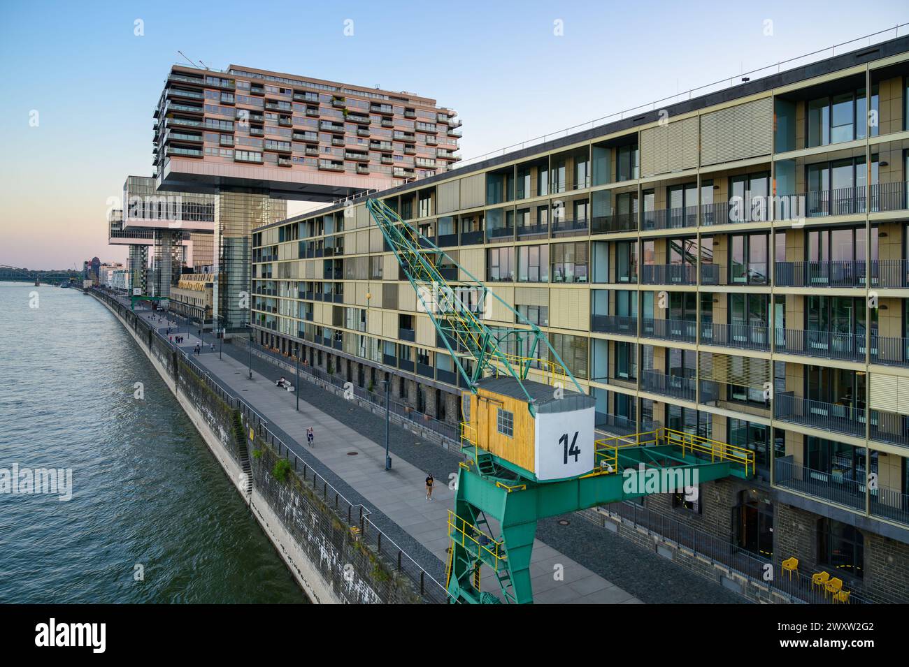 Promenade at the Rhine Harbor in Cologne, Germany: Modern apartment and ...