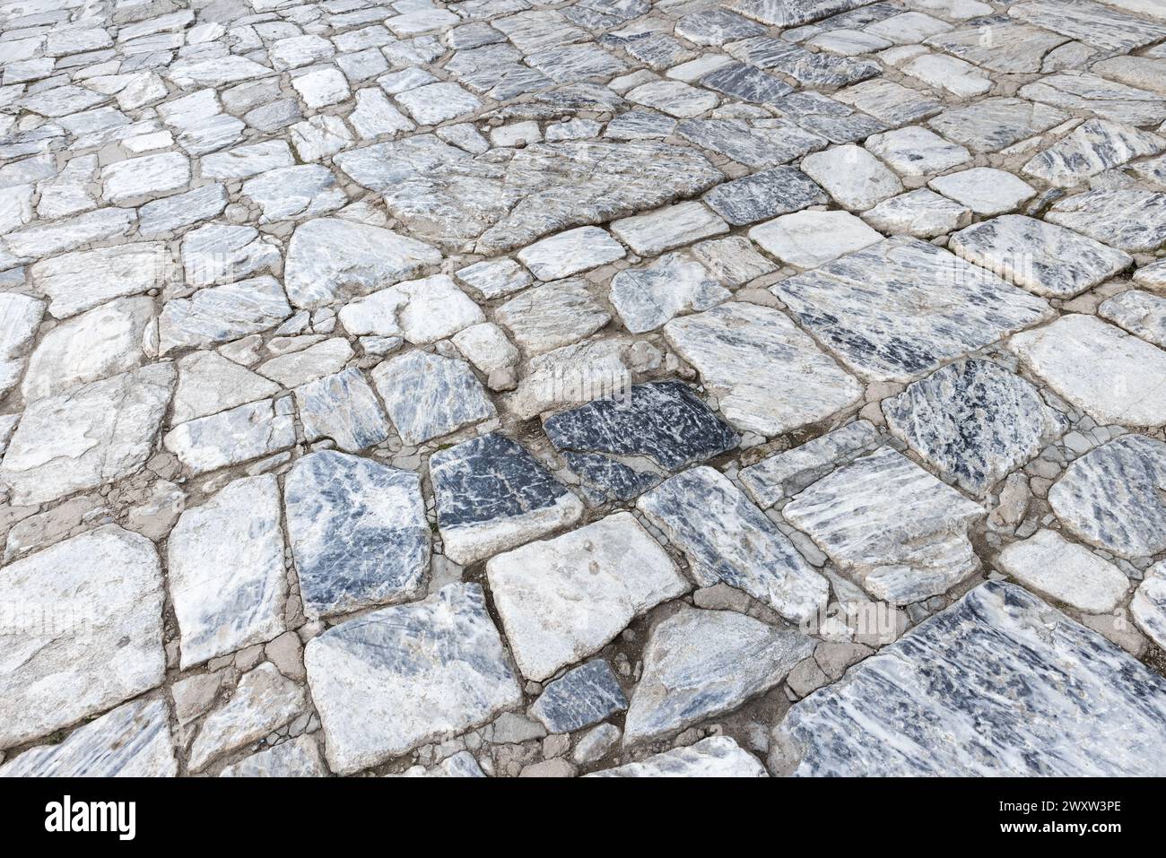 Old round gray stone pavement, background photo texture Stock Photo - Alamy