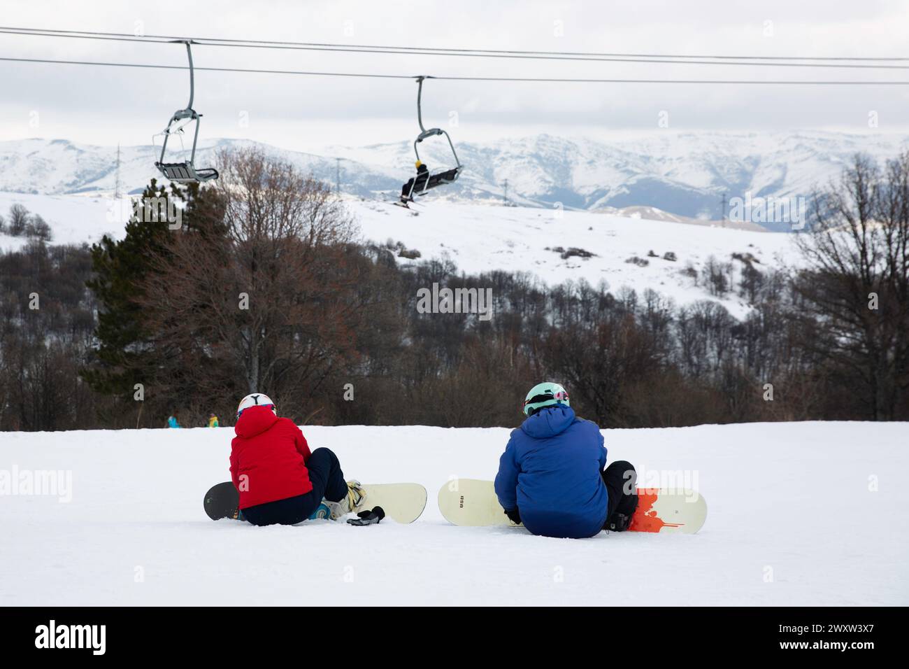Sitting on a slope hi-res stock photography and images - Alamy