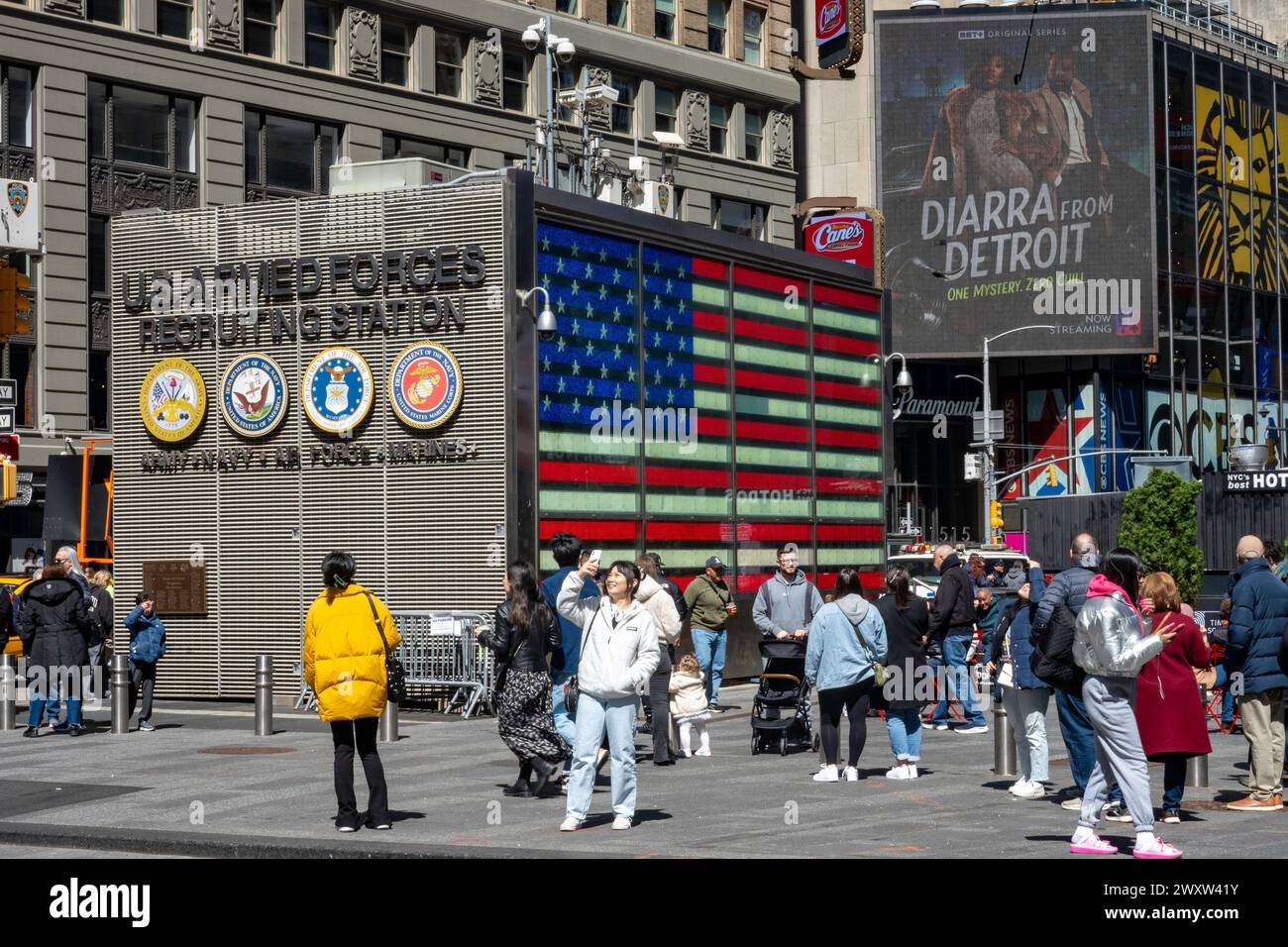 U.S Armed Forces Recruiting Station featuring large neon American flag ...