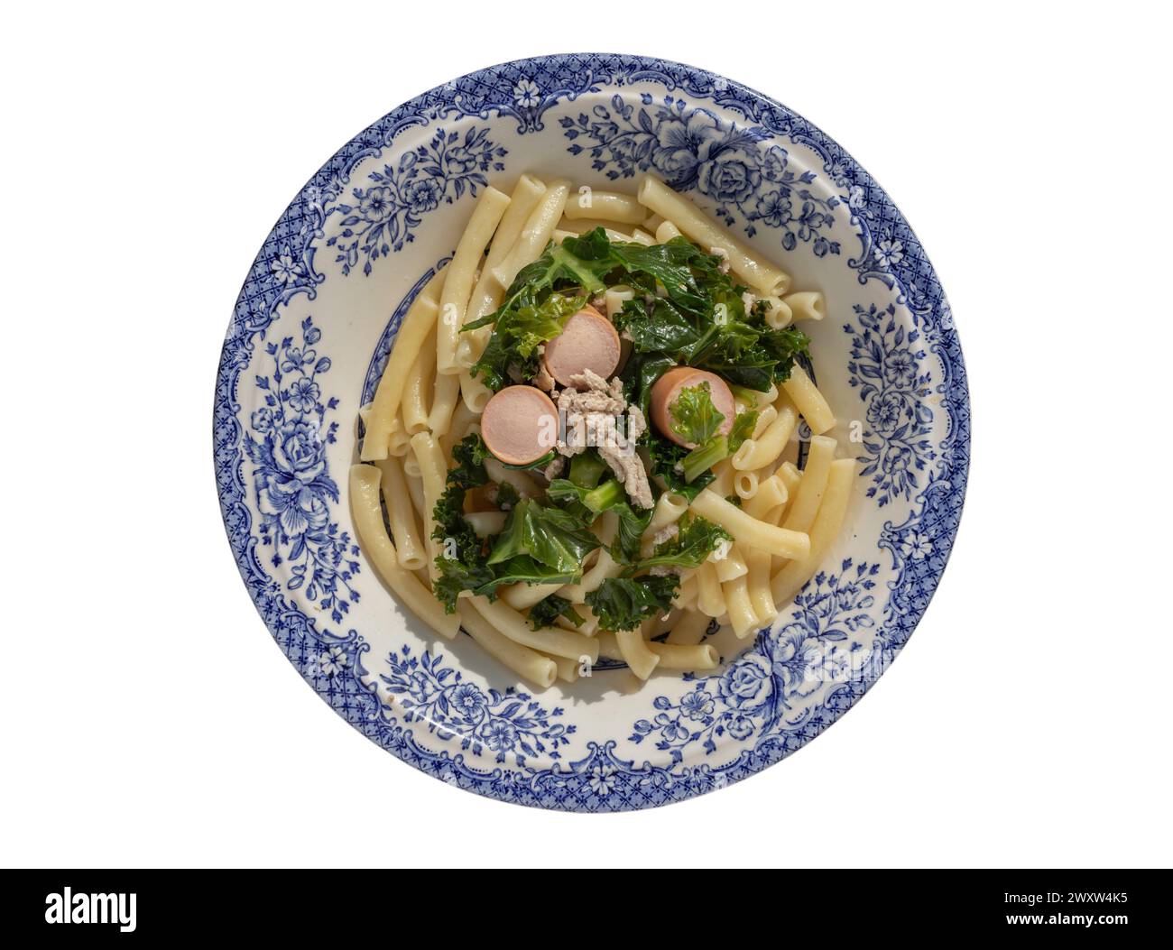 Plate of Penne pasta with Sausage, Pork and Kale isolated on white ...