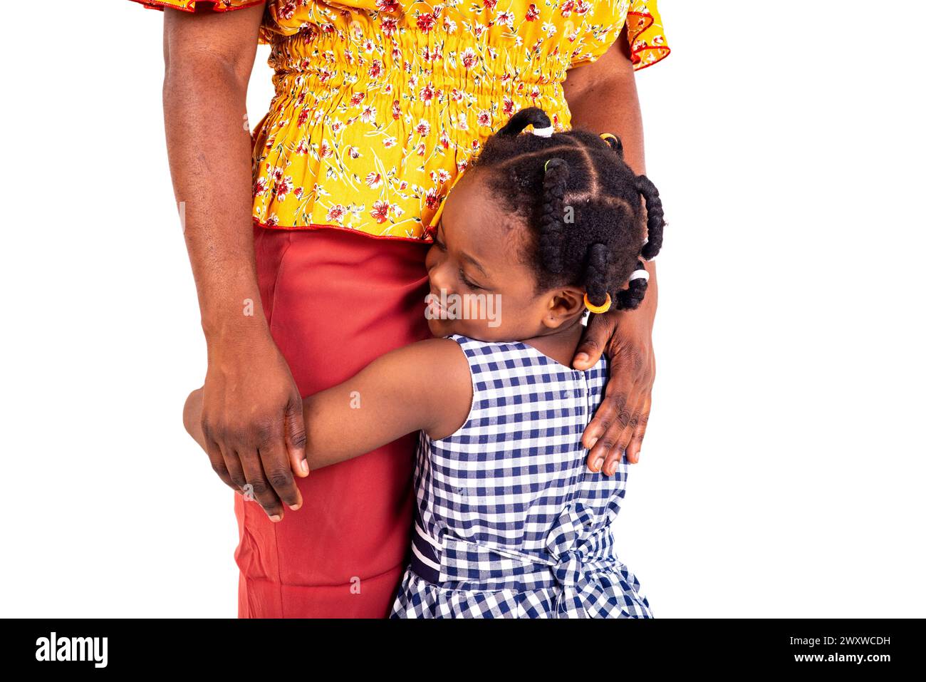 an angry girl standing in uniform on white background afraid of going ...