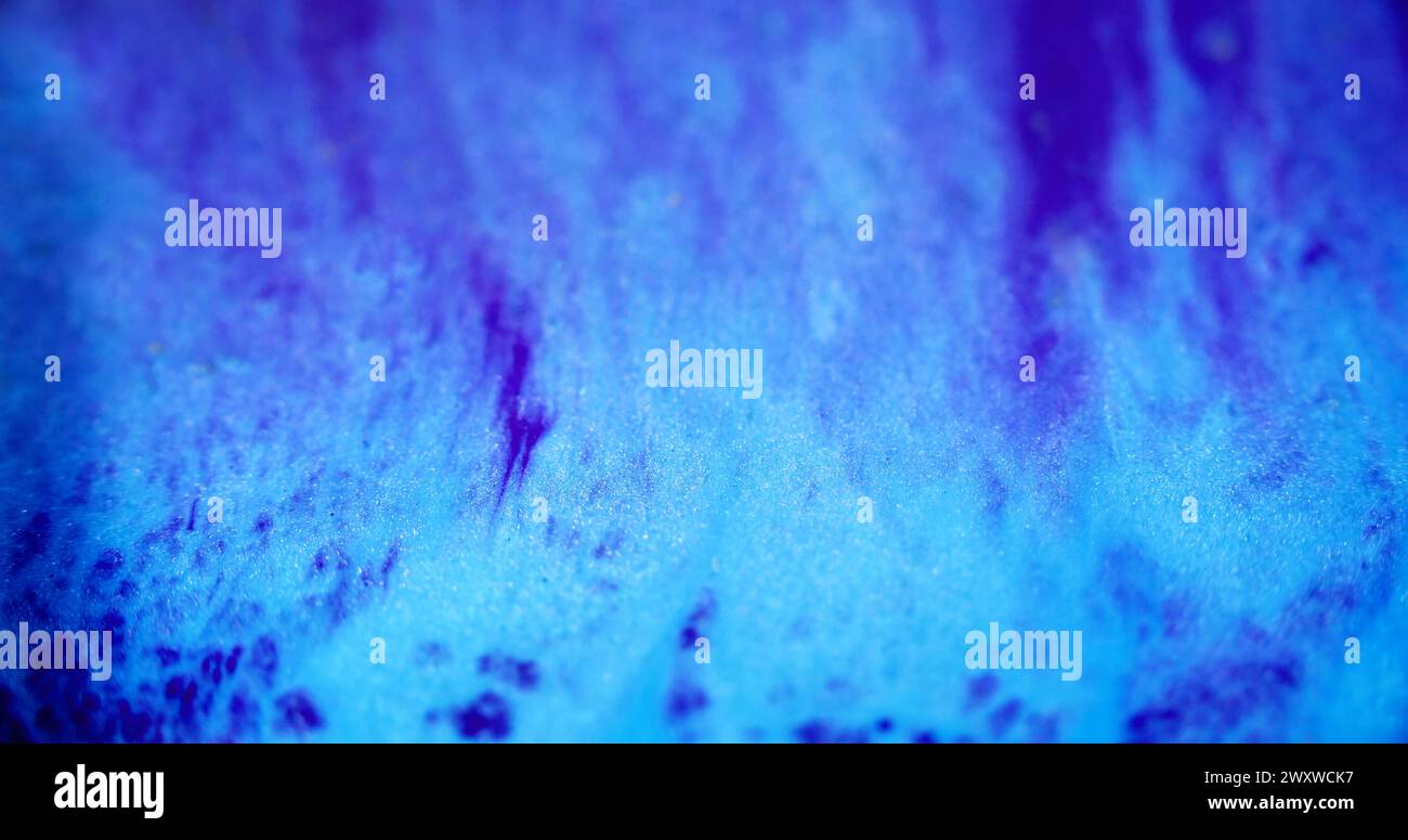 Shiny fluid flow. Glitter gloss texture. Defocused blue purple color ...