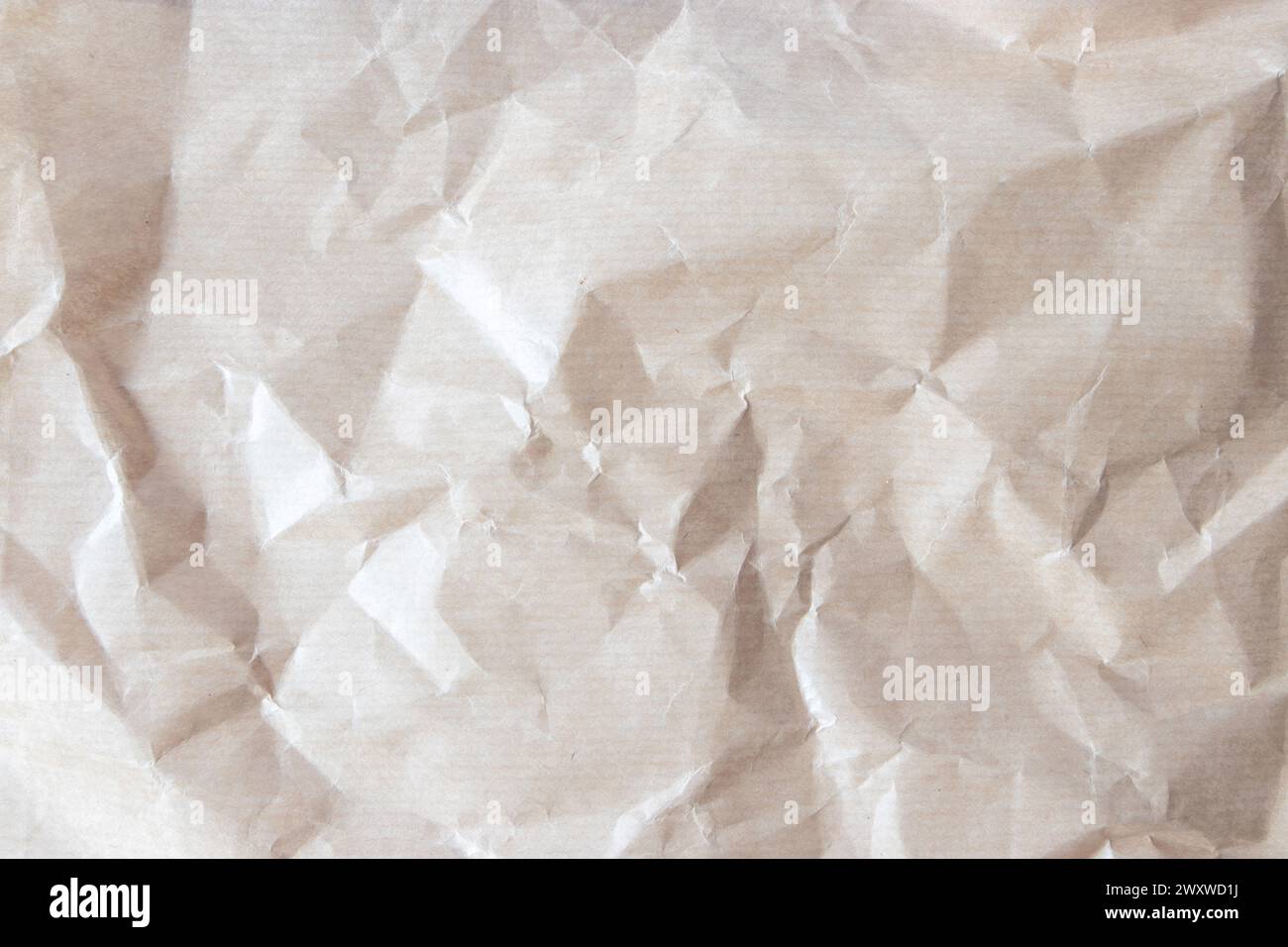 Wrinkled recycled brown brown kraft paper background. Crumpled striped ...