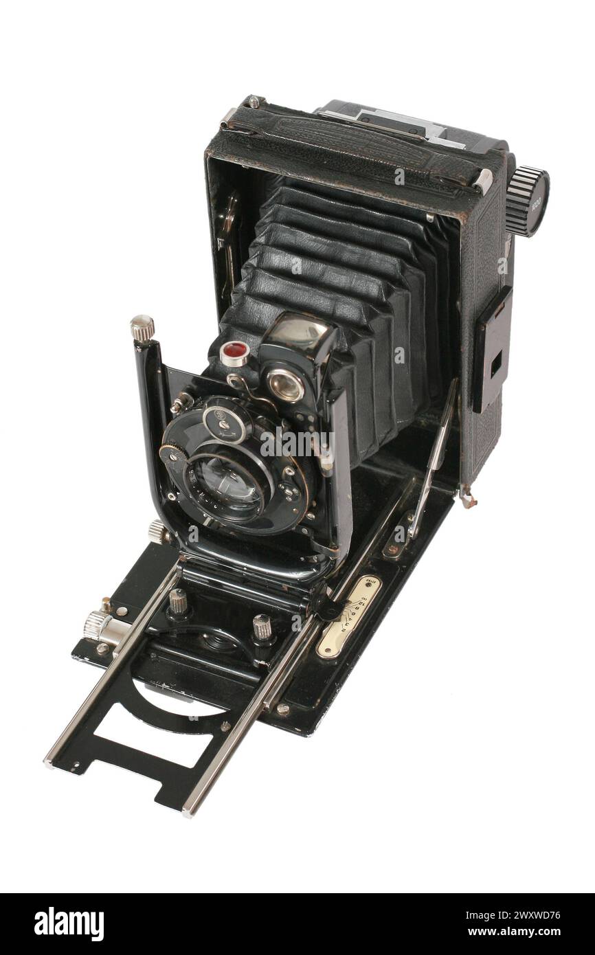 Old vintage black camera isolated on white background with cliping path ...