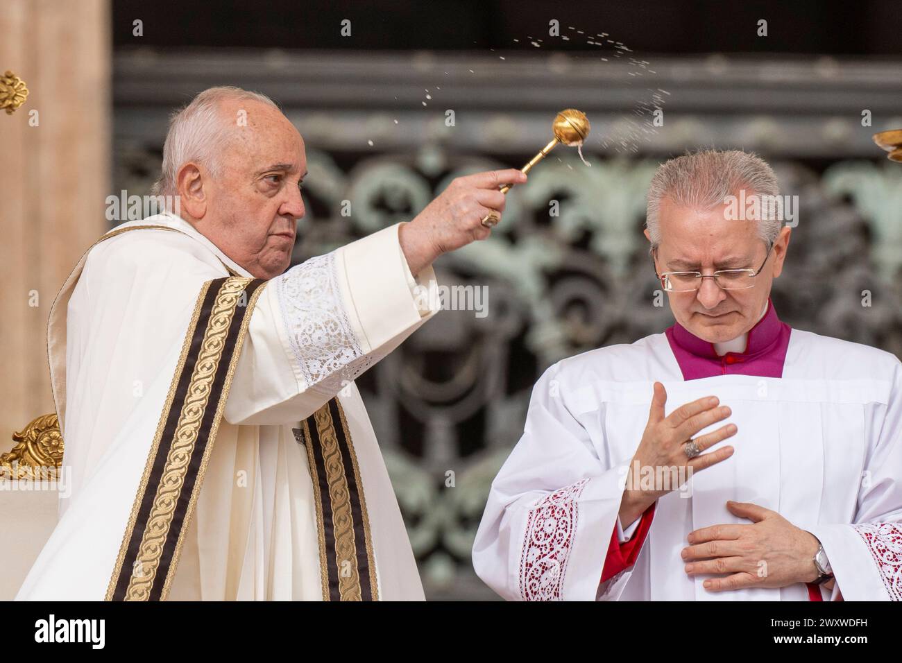 Pope Francis delivers his blessing during the Easter Holy Mass. Pope ...