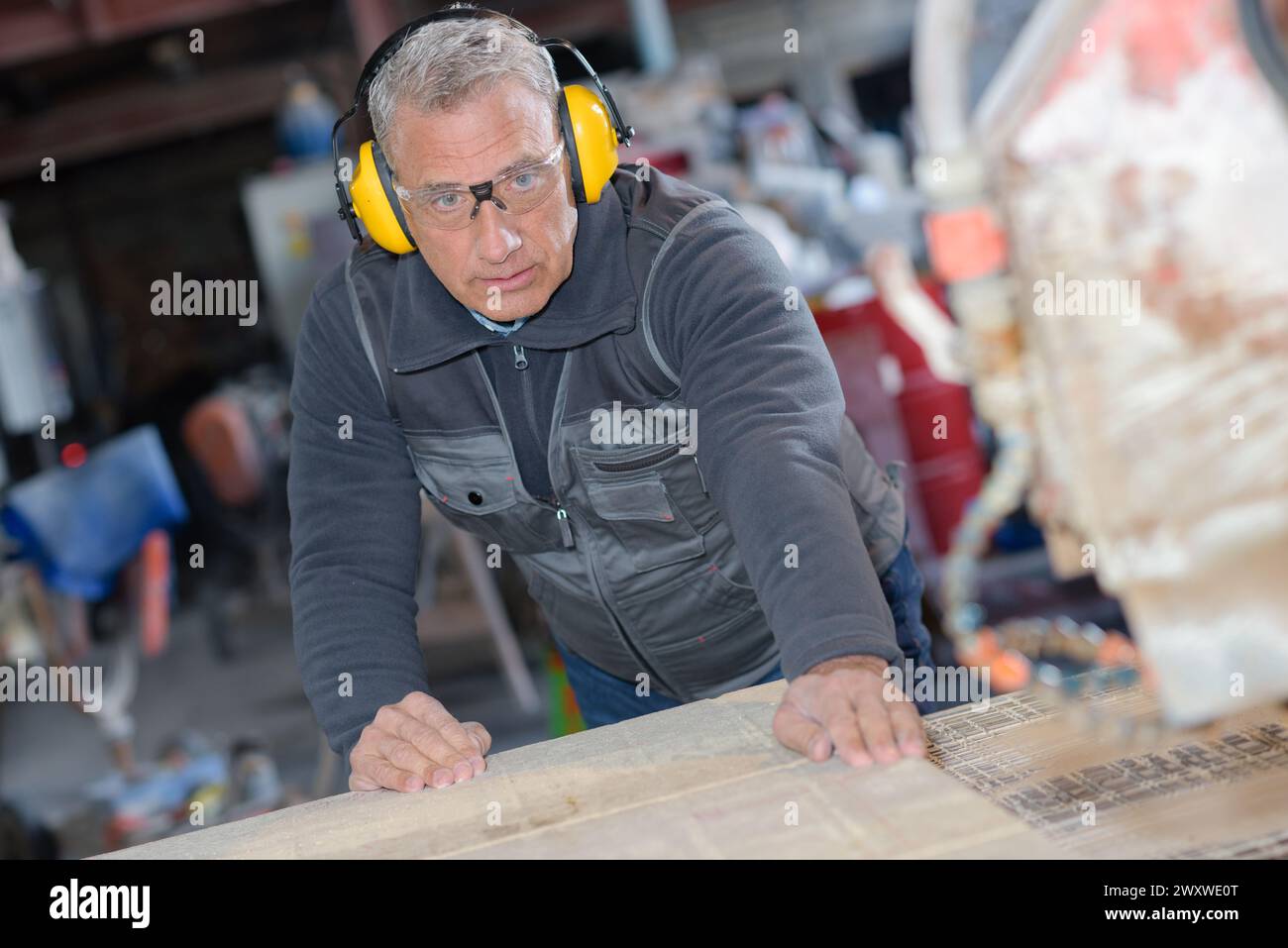senior craftsman drawing a plan at carpenter workshop Stock Photo - Alamy