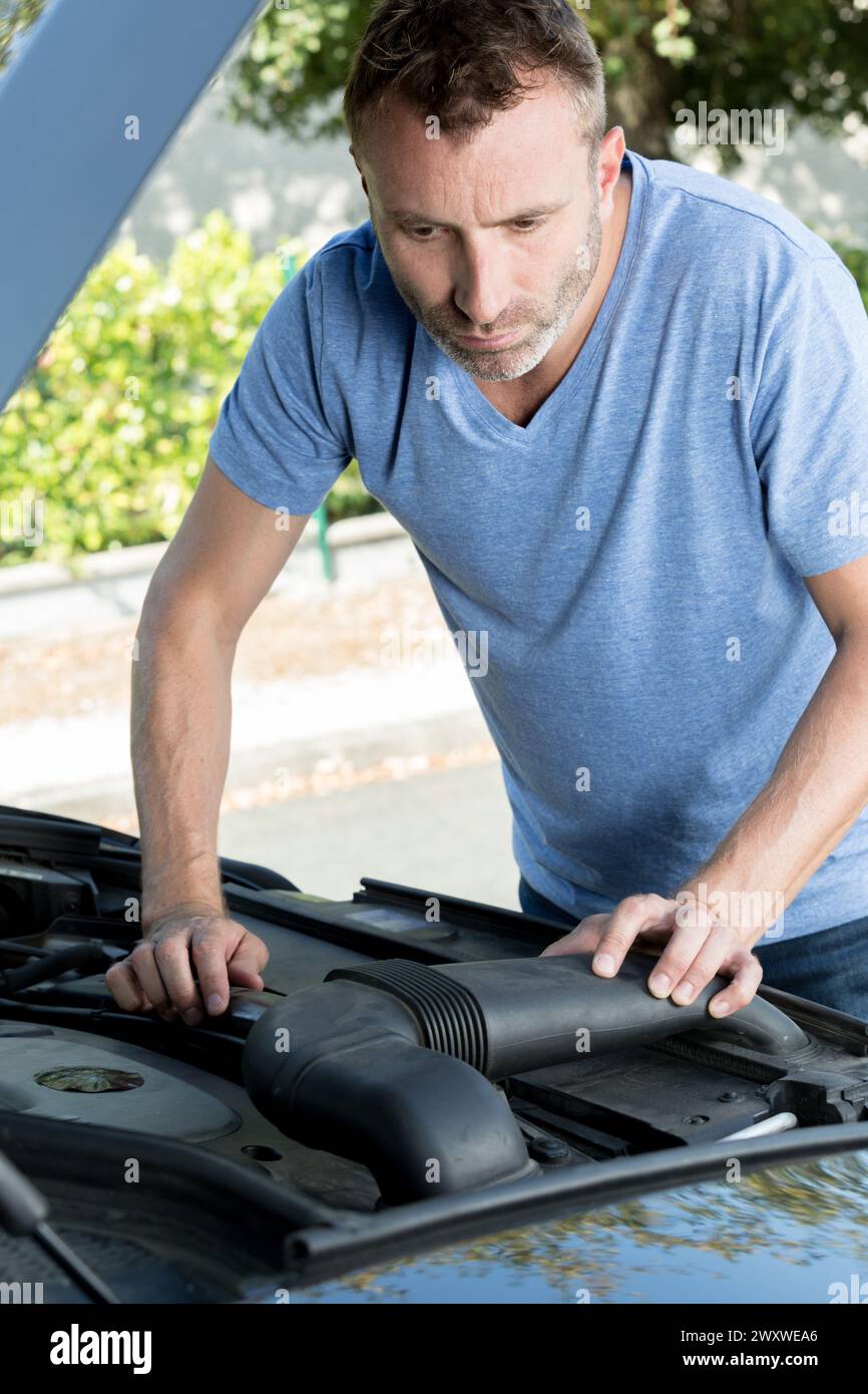 Motor under front bonnet hi-res stock photography and images - Alamy
