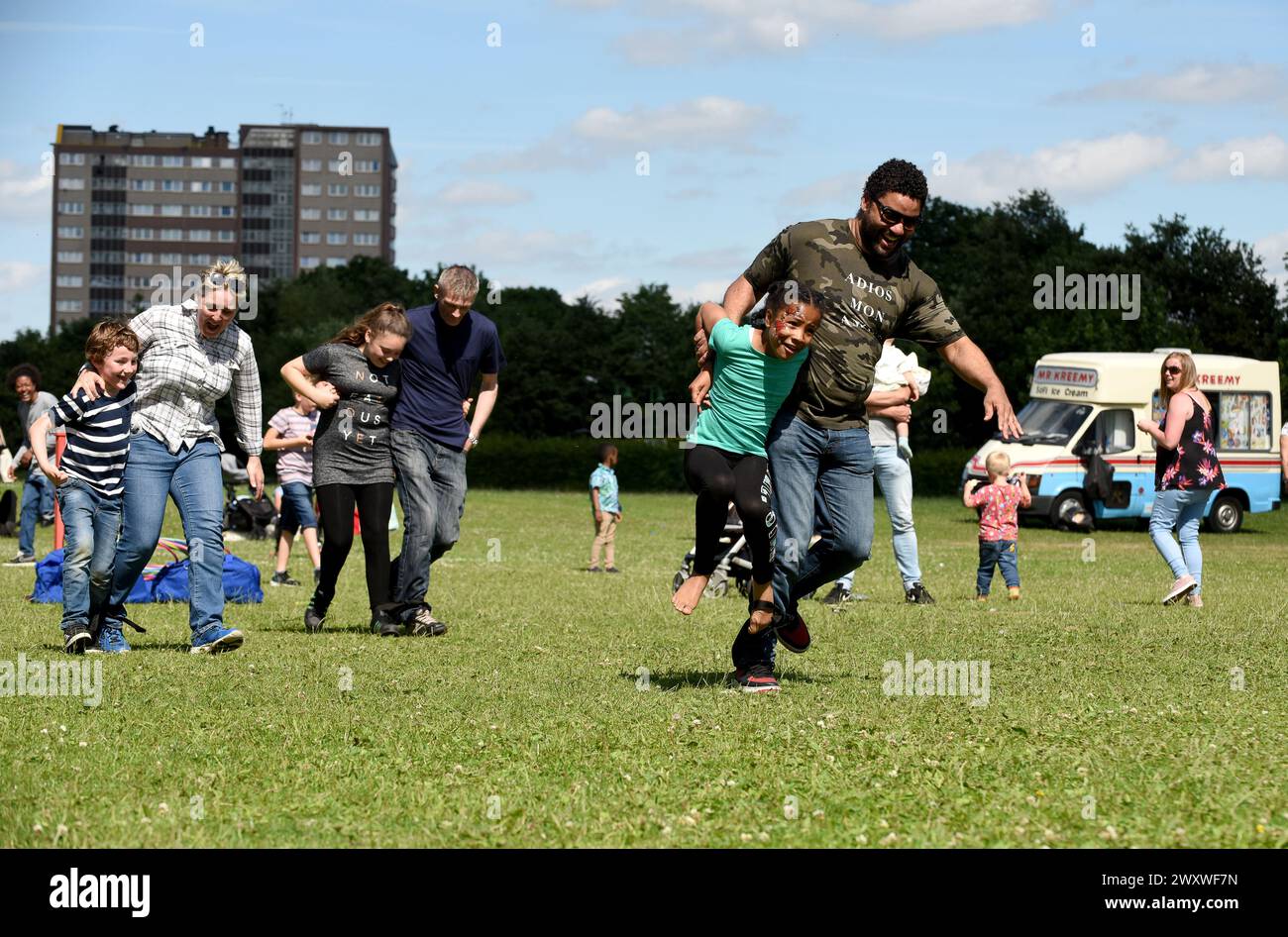 Families three legged race in the park in Nechells, Birmingham Stock ...