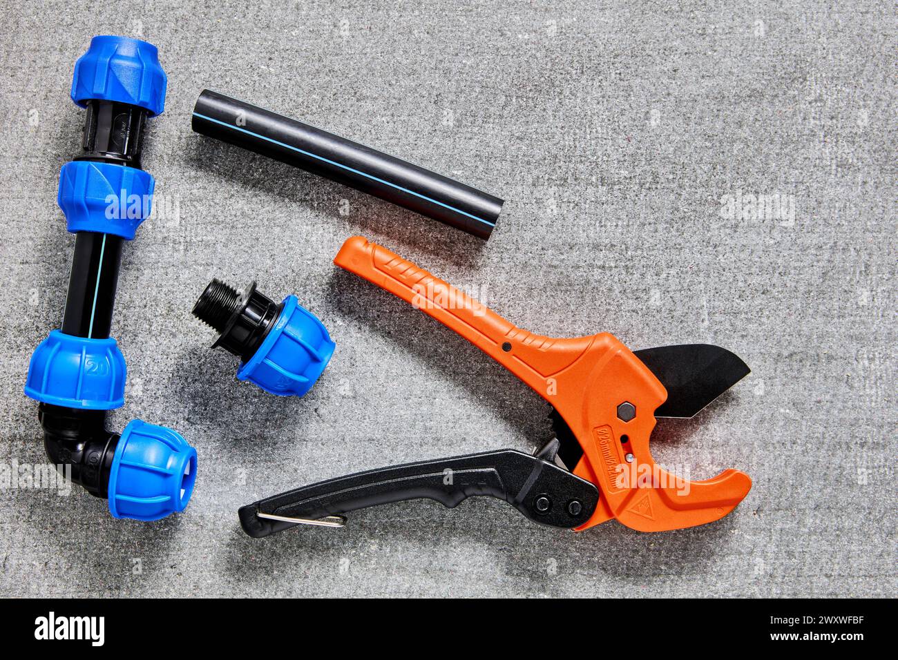 Hand plastic pipe shears with adaptor fitting, compression clamp ...