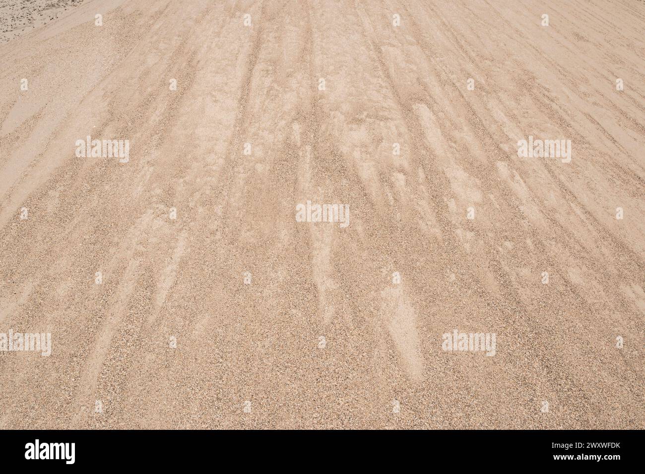 Fine river sand from gravel pit pile closeup as beige sand natural ...